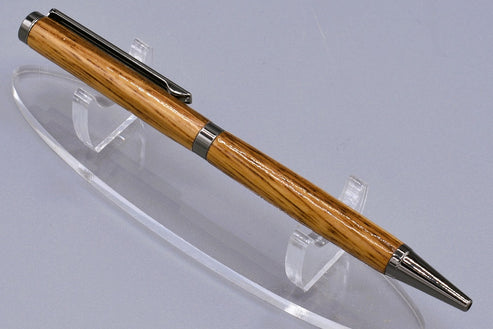 Handmade Slim twist pen. Zebra wood – Grumpy Guy Pens